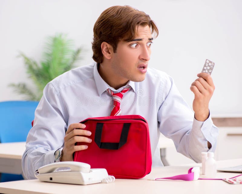 Man with First Aid Kit in the Office Stock Photo - Image of illness ...