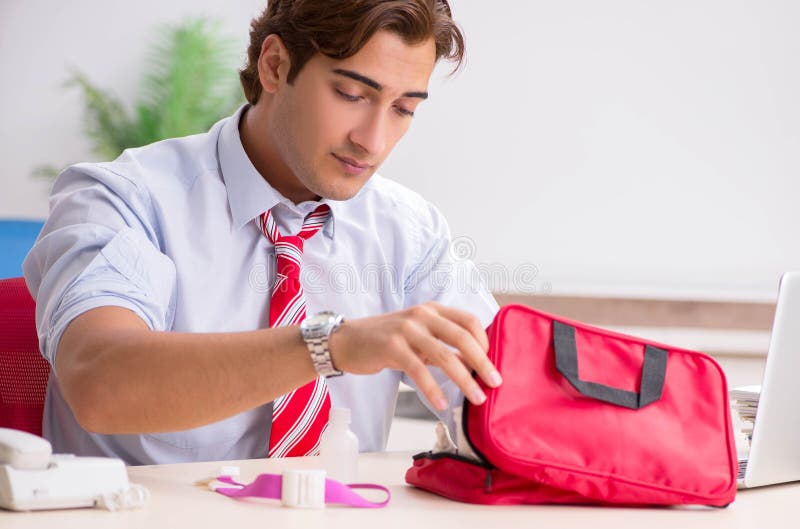 Man with First Aid Kit in the Office Stock Image - Image of accident ...