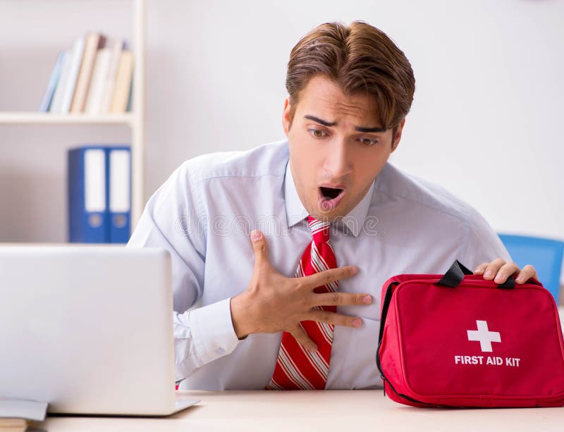 Man with First Aid Kit in the Office Stock Image - Image of accident ...
