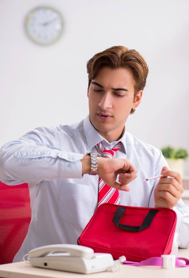 Man with First Aid Kit in the Office Stock Photo - Image of health ...