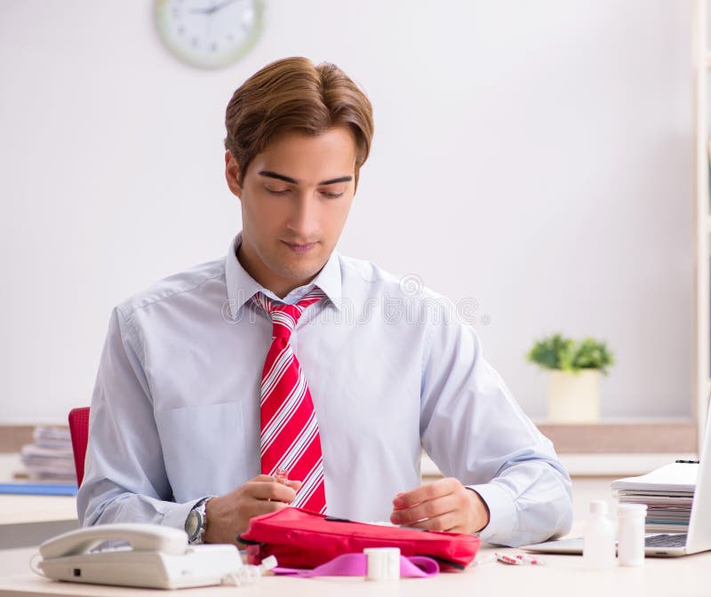 Man with First Aid Kit in the Office Stock Photo - Image of care ...