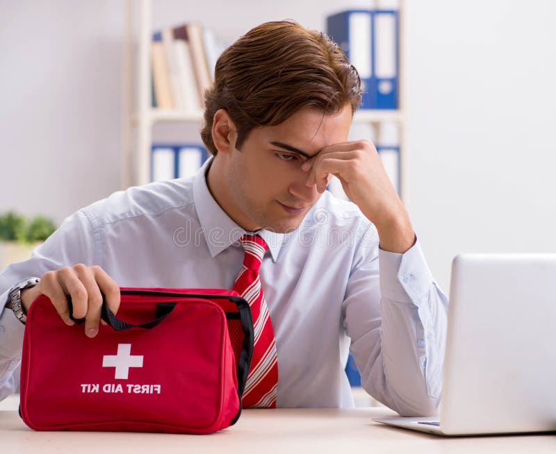 Man with First Aid Kit in the Office Stock Image - Image of emergency ...