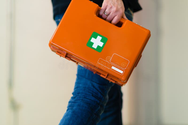 Man with First Aid Kit Runs To Help Stock Image - Image of cross ...