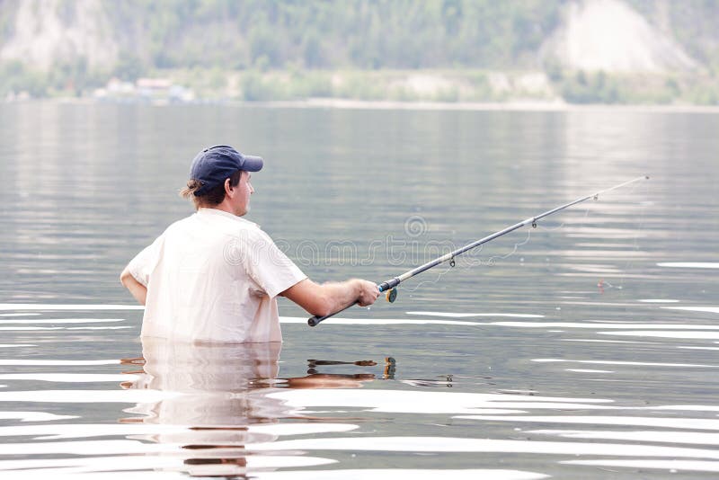 Man fishing in the river stock image. Image of fisherman - 26186803