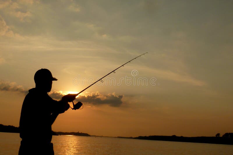 Man fishing on sunset stock photo. Image of ocean, fisherman - 83770712
