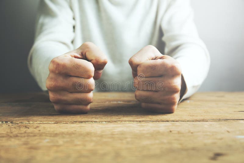 Man Fists Clenched on a Wooden Table in Anger Stock Photo - Image of ...