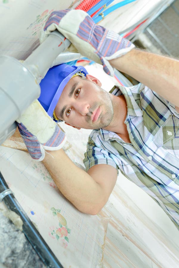 Man fitting pvc pipe stock image. Image of fitting, fixer - 198172829
