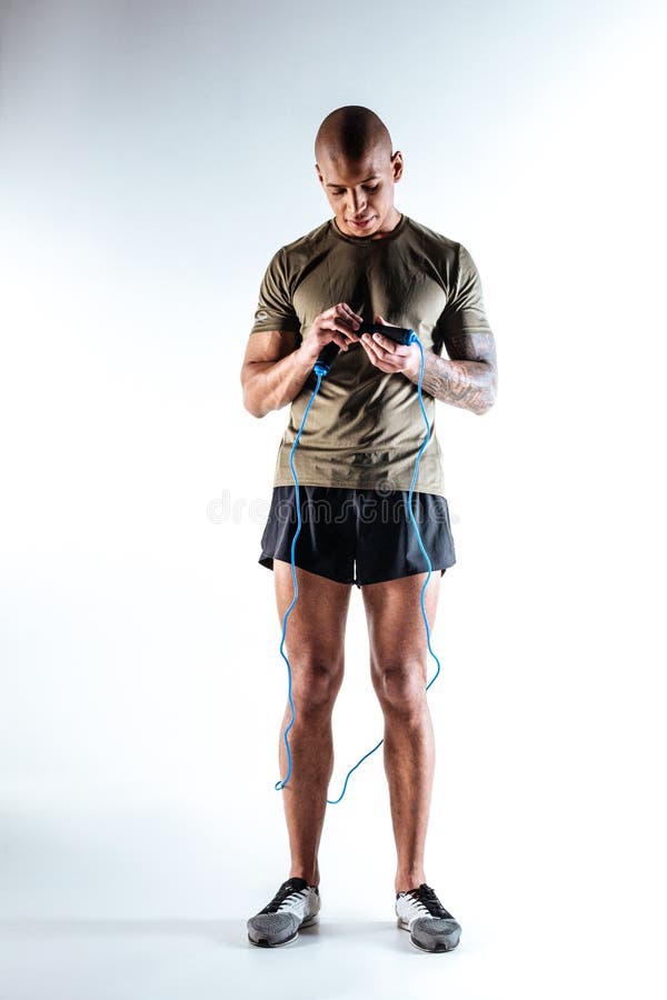 Man Fitting a Skipping Rope for Hus Height Stock Photo - Image of bold ...