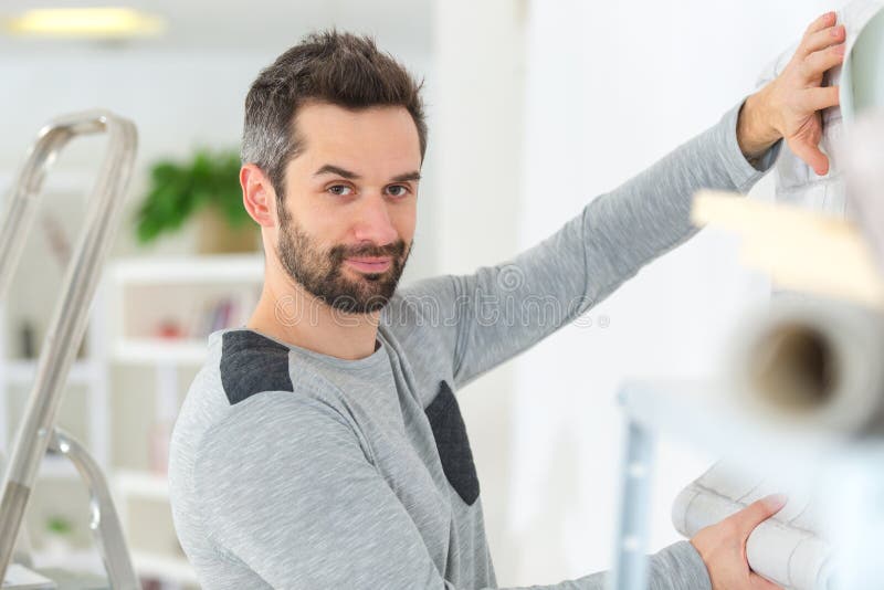 Man Fitting New Kitchen Units Stock Photo - Image of person, thoughtful ...