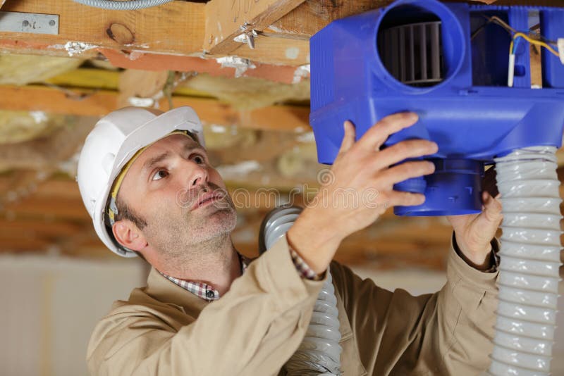 Man Fitting Ventilation Box in Ceiling Stock Photo - Image of plastic ...