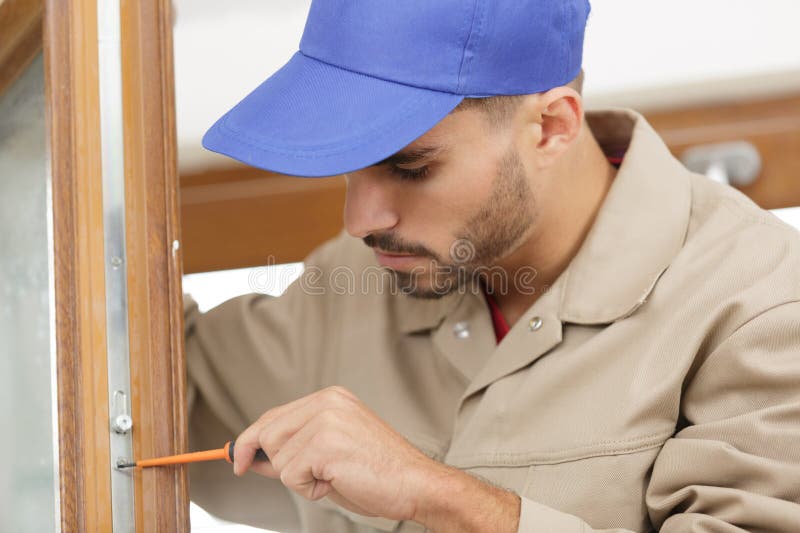 Man Fixes Basis Blinds Stock Photos - Free & Royalty-Free Stock Photos ...