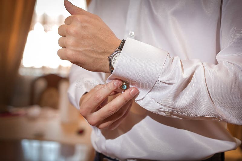 Man Fixes Cufflinks White Shirt Stock Photos - Free & Royalty-Free ...