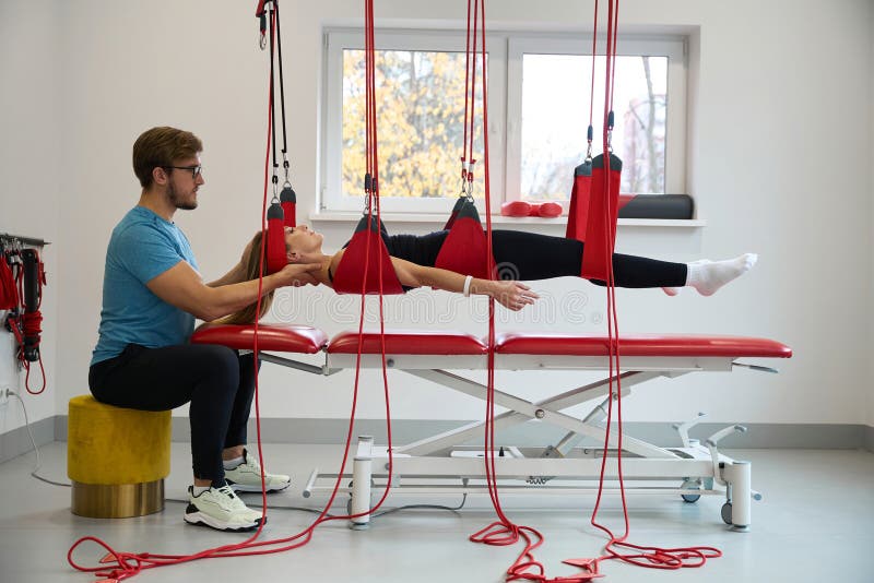 Man Fixes a Woman in Suspended Loop System on Redcord Stock Photo ...