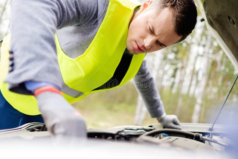Man fixing broken car stock photo. Image of hood, service - 53700876