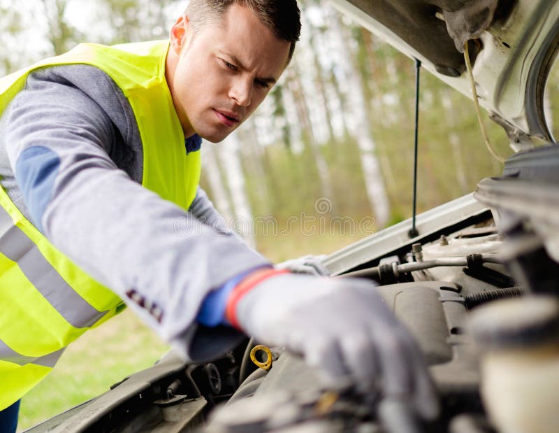 Man fixing broken car stock photo. Image of emergency - 54068698