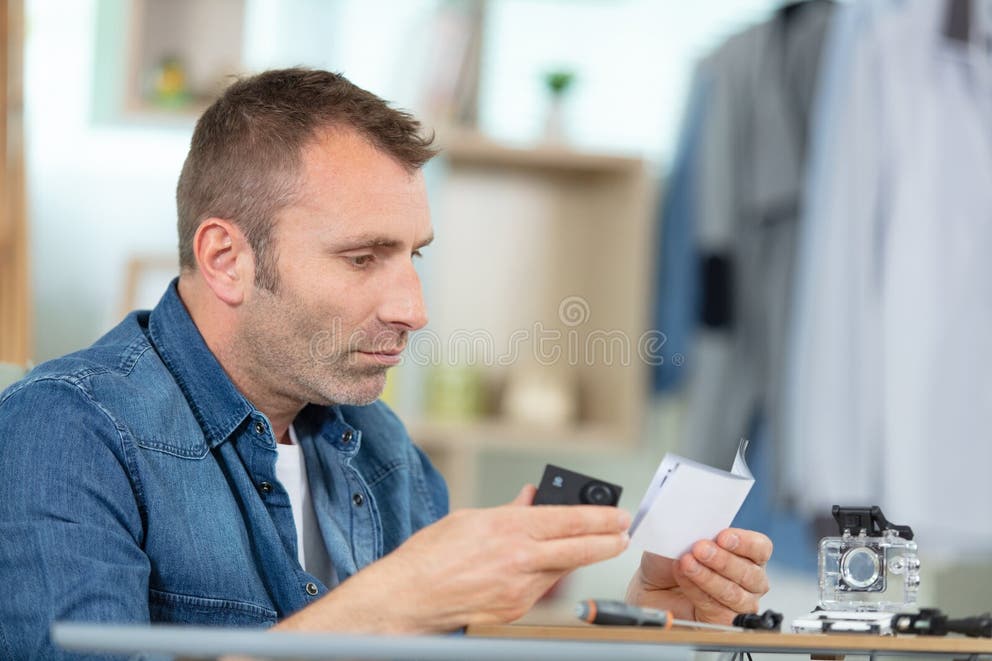 Man fixing camera stock image. Image of work, photograph - 270839807