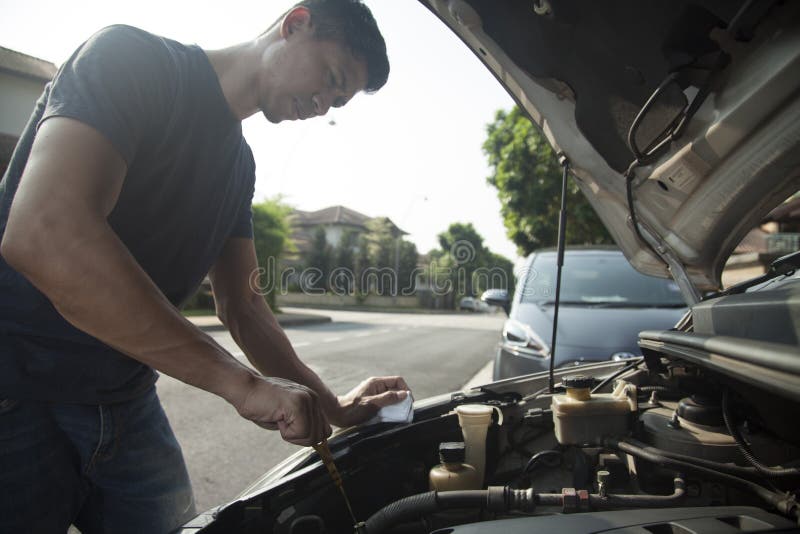 Man fixing a car stock image. Image of transportation - 183292169