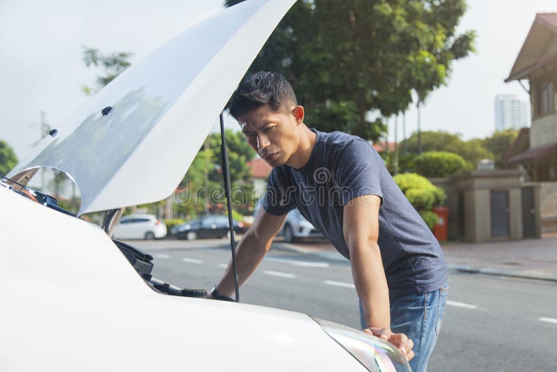 Man fixing a car stock image. Image of opening, mechanic - 183292771
