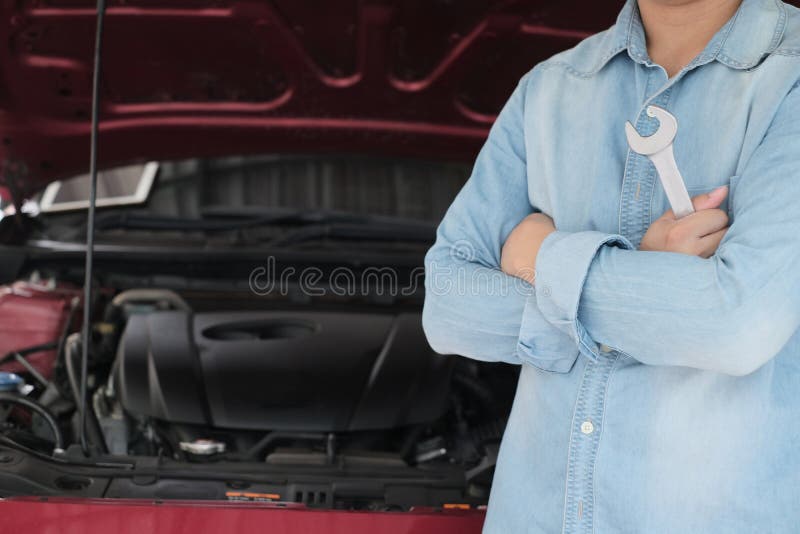 A Man Fixing the Car Engine with Copy Space Stock Image - Image of ...