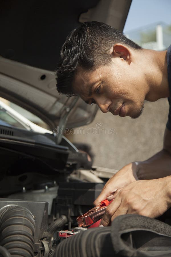 Man fixing a car stock photo. Image of fixing, vehicle - 183292472