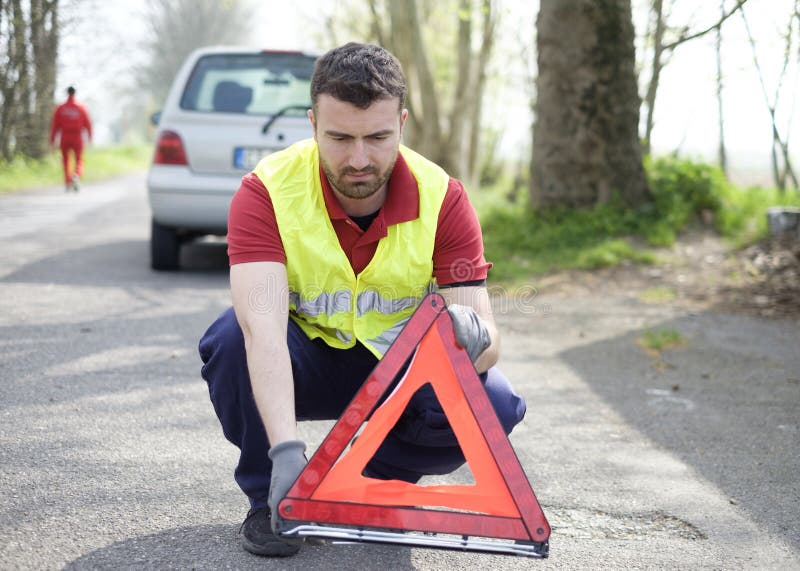 Man Fixing a Car Problem after Vehicle Breakdown on the Road Stock ...