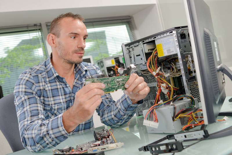 Man fixing computer stock image. Image of engineer, repair - 249438331