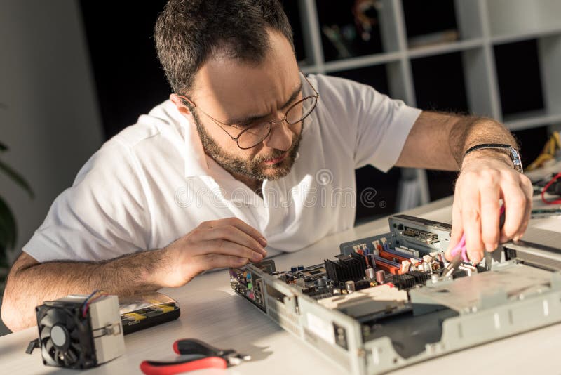 Man Fixing Computer Motherboard Stock Image - Image of worker ...