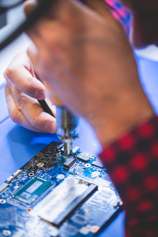 Man fixing computer stock image. Image of desktop, east - 42220465