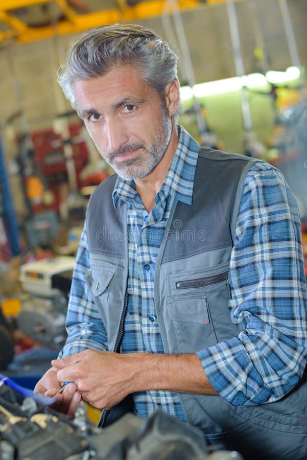 Man fixing defective parts stock photo. Image of plug - 326232610