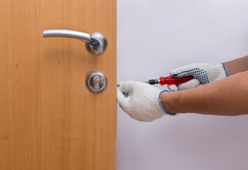 Man Fixing the Door with Screwdriver Stock Image - Image of ...