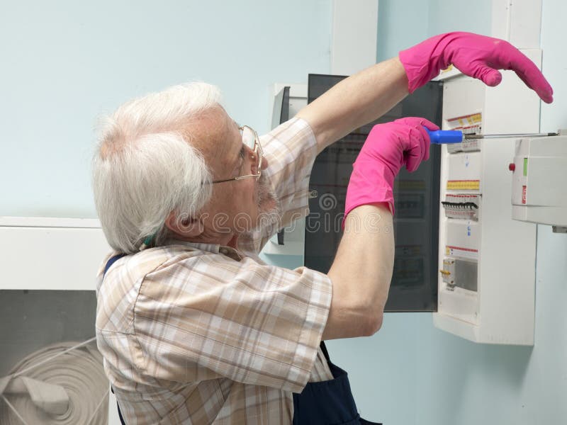 Man Fixing Electric Light Meter Stock Image - Image of builder ...