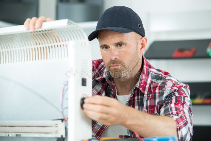 Man Fixing Heating Radiator Stock Photo - Image of central, thermometer ...