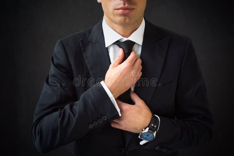 Man fixing his tie stock image. Image of corporate, person - 72593201