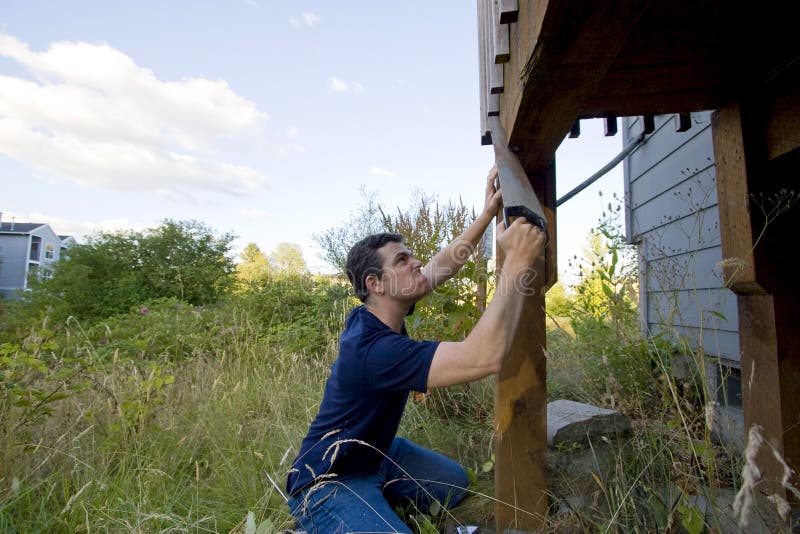 Man Fixing House - Horizontal Stock Photo - Image of male, self: 6201824