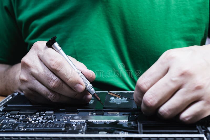 Man fixing laptop computer stock photo. Image of equipment - 232085852 Man fixing laptop computer stock photo. Image of equipment - 232085852