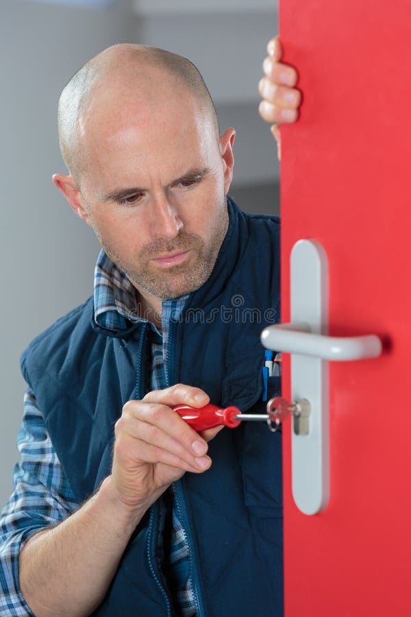 Man Fixing Lock on Internal Door Stock Photo - Image of work, handle ...