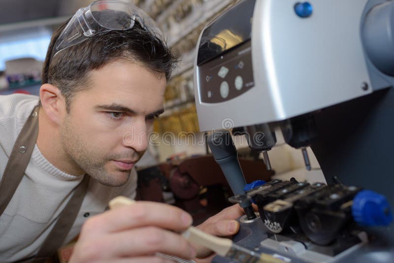 Man fixing machine stock image. Image of manual, inspection - 298851035