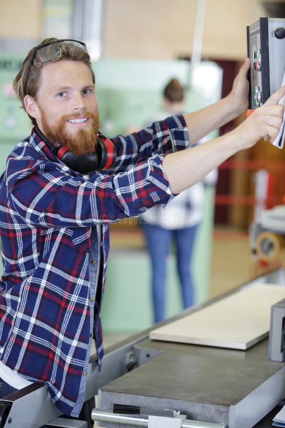 Man fixing machine stock image. Image of plant, machine - 257189847