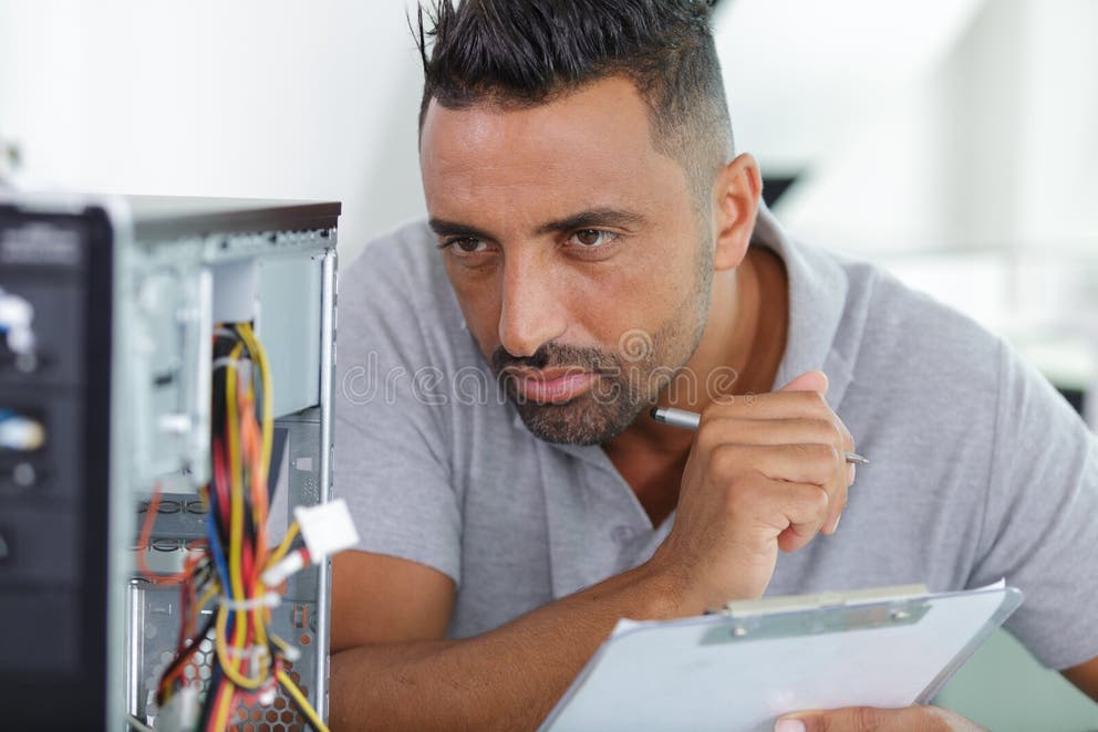 Man fixing pc stock photo. Image of electronics, color - 261511944