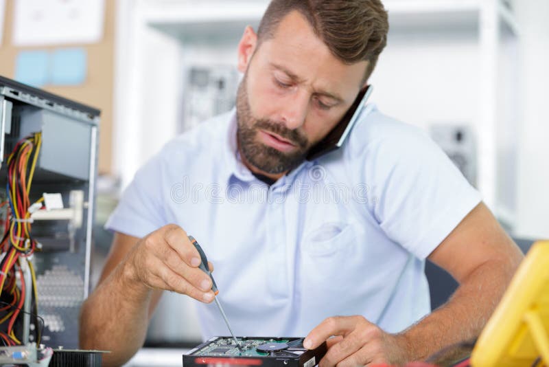 Man Fixing Pc while Talking To Customer Stock Image - Image of ...