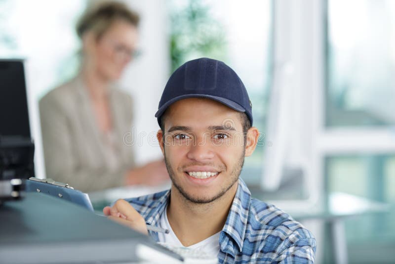 Man Fixing Photocopy Machine Stock Image - Image of machine, multimedia ...