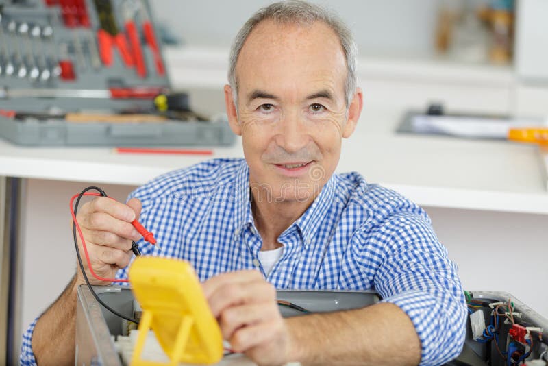 Man fixing problem stock image. Image of voltage, industry - 237933611