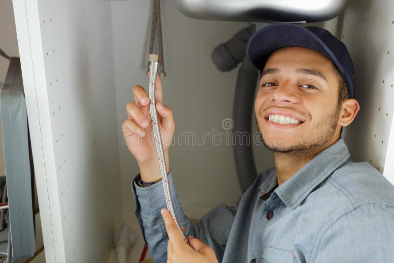 Man Fixing Sink Pipe in Kitchen Stock Image - Image of domesticlife ...