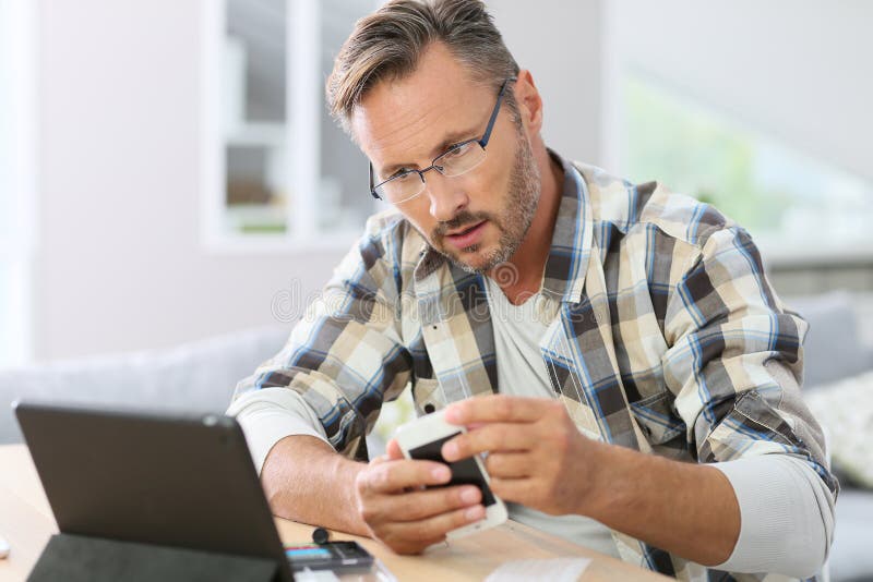 Man Fixing Smartphone with Internet Assistance Stock Image - Image of ...