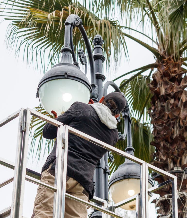 256 Man Fixing Street Light Pole Stock Photos - Free & Royalty-Free ...