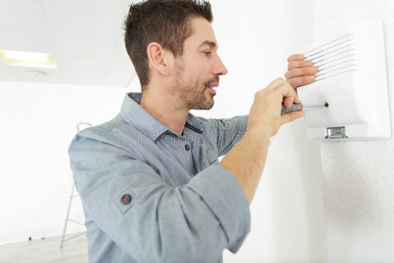 Man Fixing Technical Problem at Home Stock Photo - Image of people ...