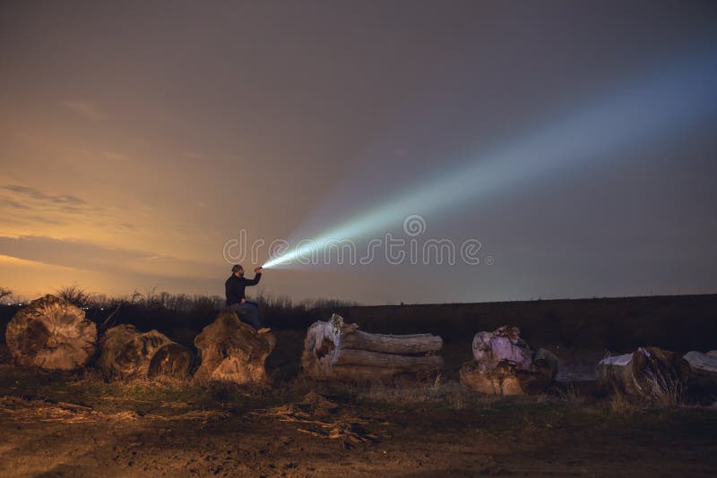 Man pointing at stars stock photo. Image of lighting - 89839270