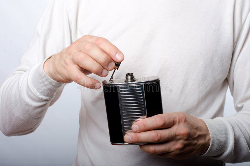 The Man with the Flask of Water Stock Photo - Image of dress, chic ...