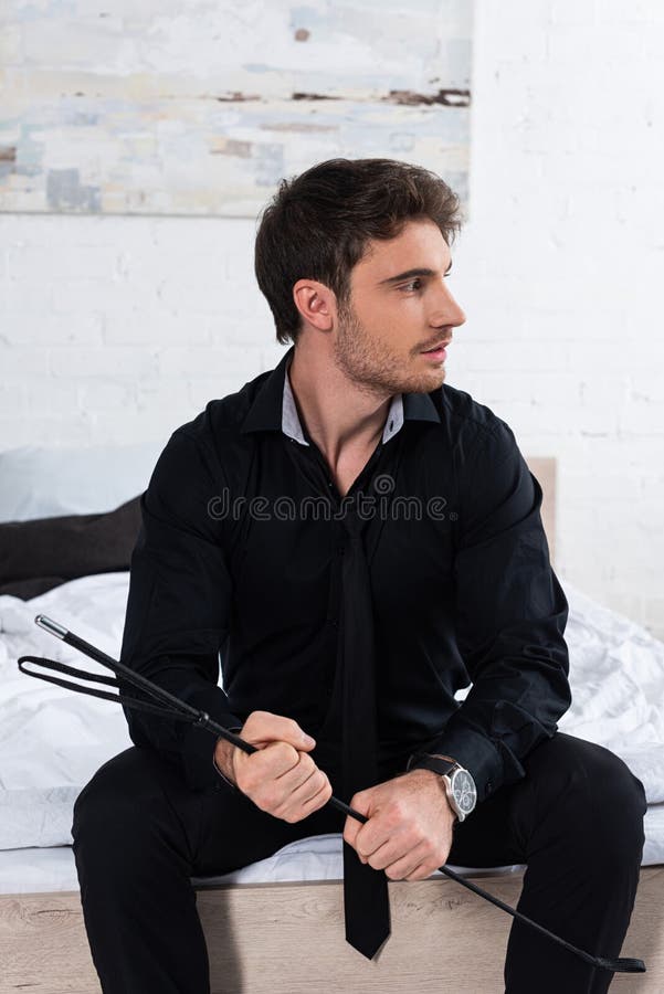 With Flogging Whip Looking Away and Stock Photo - Image of bedding ...