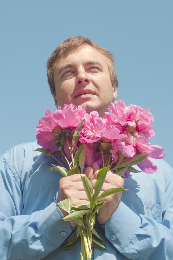 Man and flowers. stock image. Image of happiness, nature - 25329863